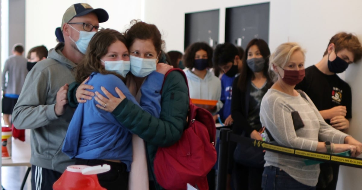 ‘Is it ok to take off masks and hug?’: Answering the top Googled ...