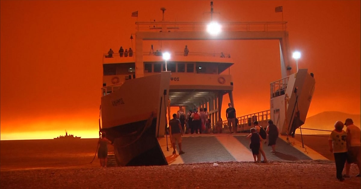 Greek island wildfires turn sky blood orange as evacuations continue