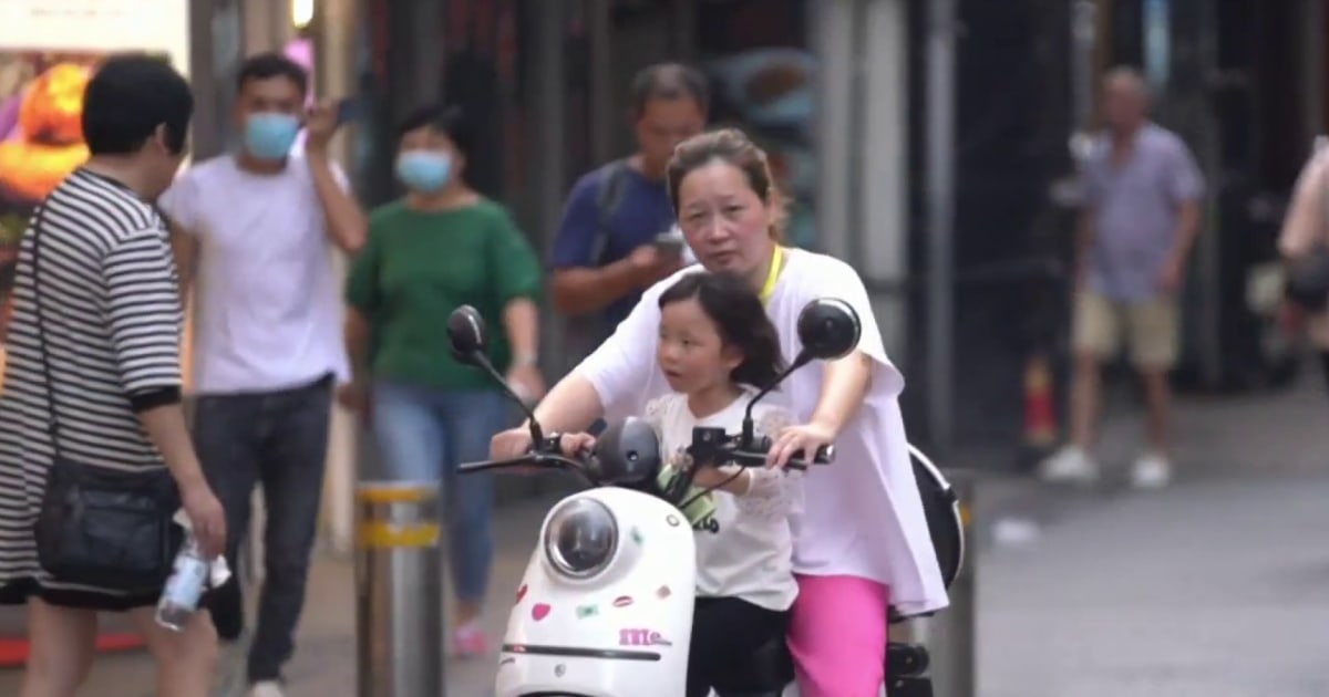 China pushes three child policy