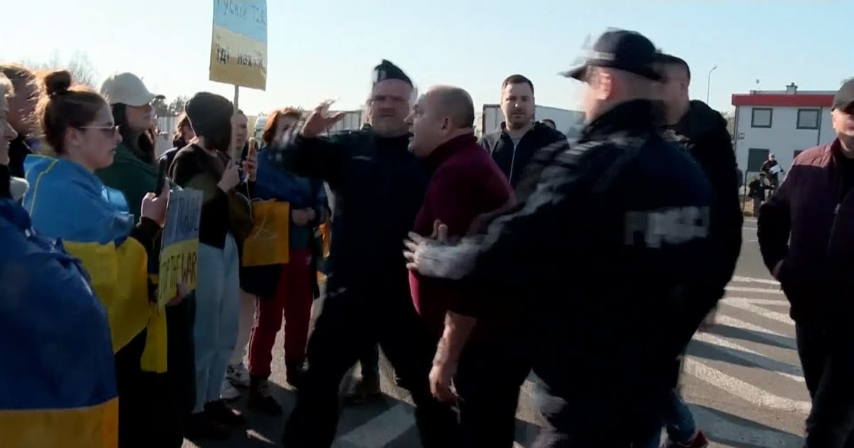 Truck drivers confront protesters at Poland-Belarus border