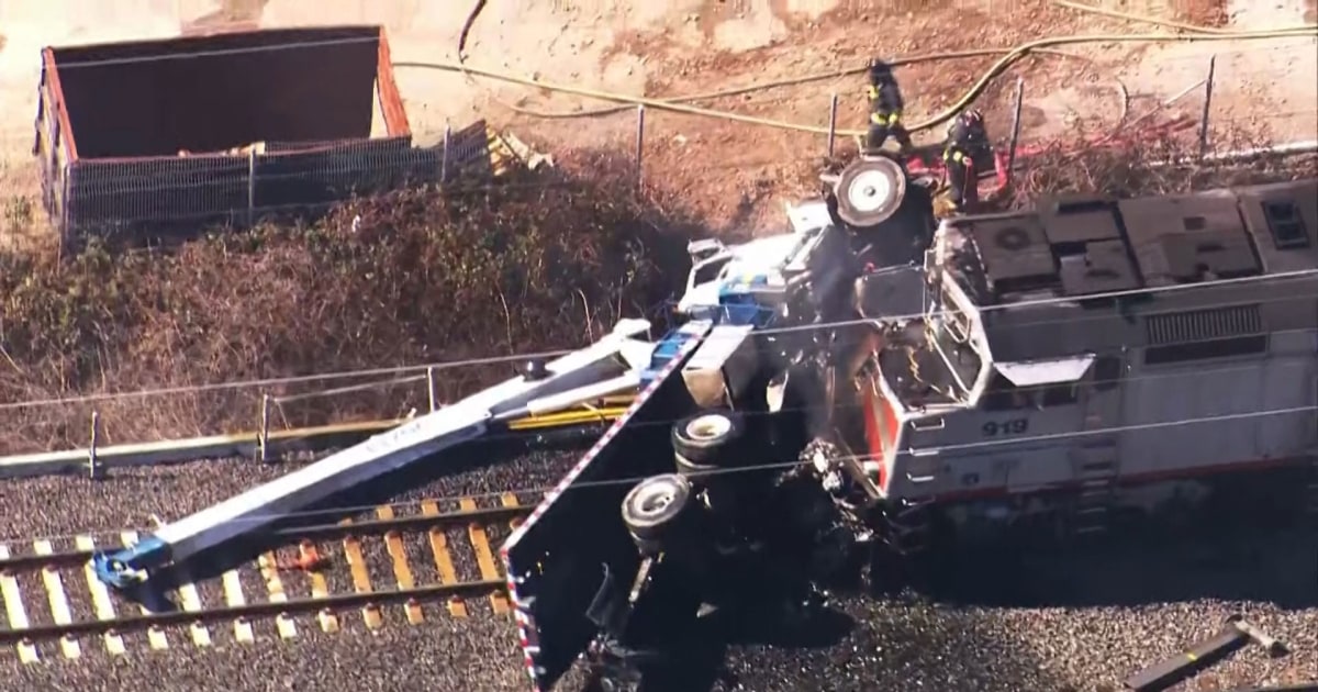 Train collides with construction vehicle, leaving multiple wounded in ...