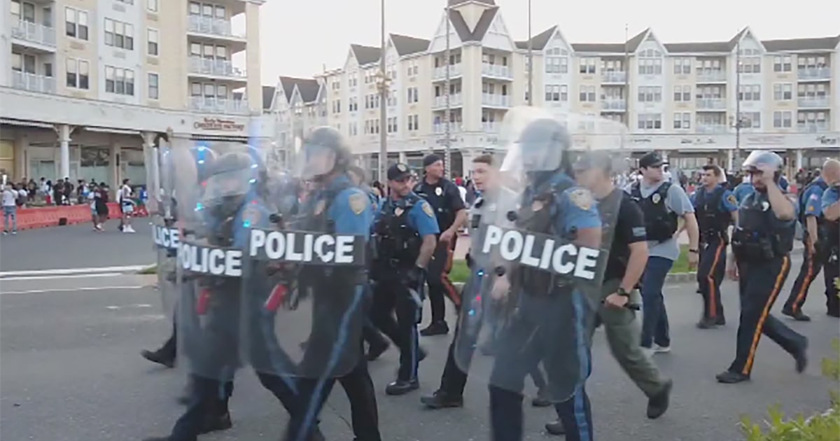 Watch: Chaos erupts as police disperse thousands on New Jersey beach