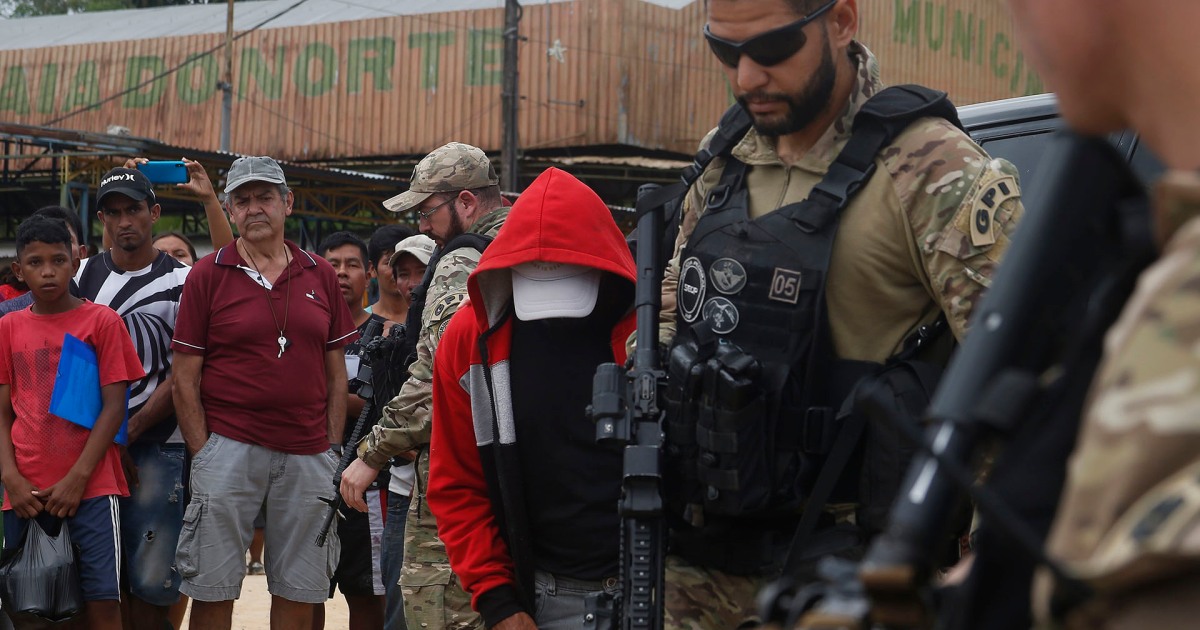 Suspect in Amazon disappearances taken onto river by Brazilian police