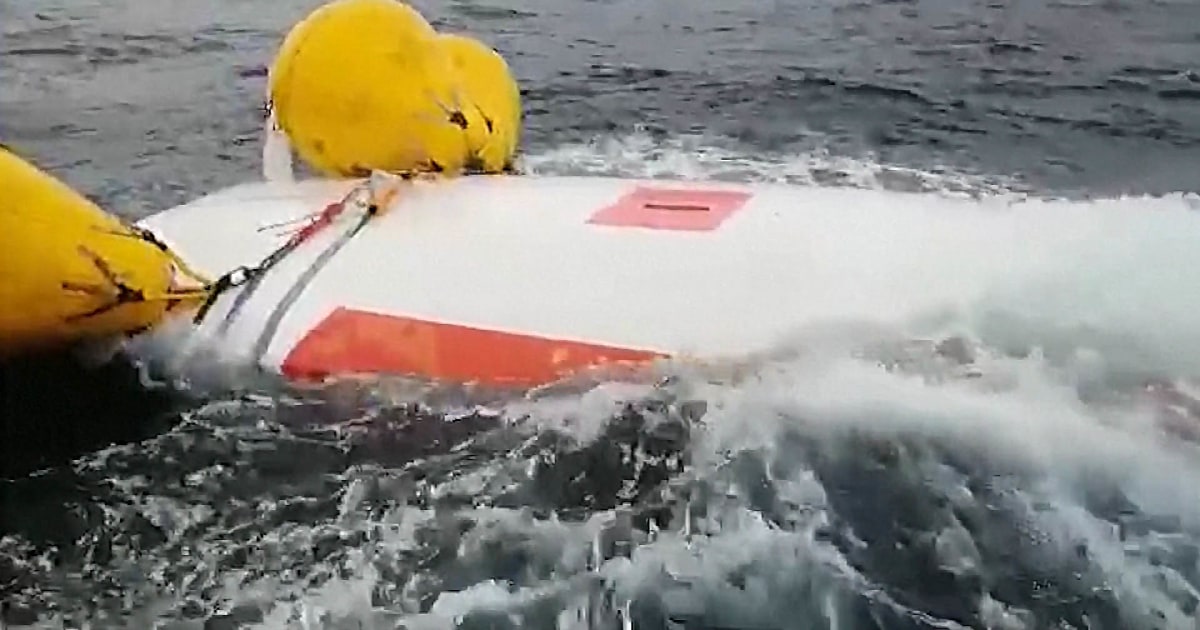 Sailor rescued after 16 hours under capsized boat