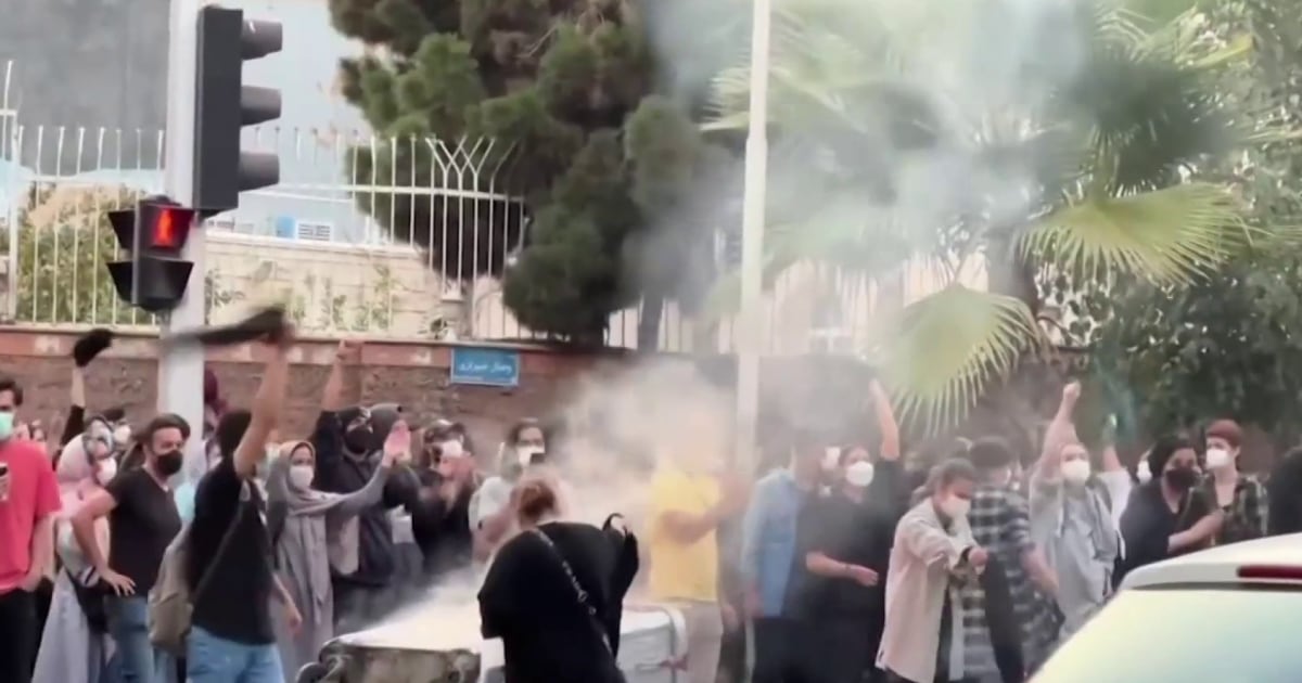 Death of Iranian woman arrested over dress code violation sparks protests
