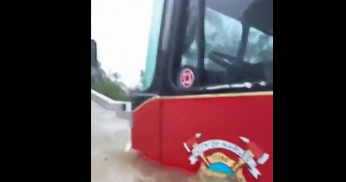 Fire trucks in Naples caught in flooding