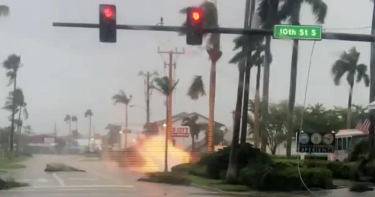 Video shows burning power line, falling traffic light after Ian