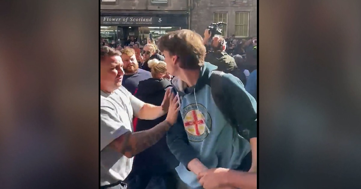 Protester dragged from crowd for heckling Prince Andrew at royal coffin ...