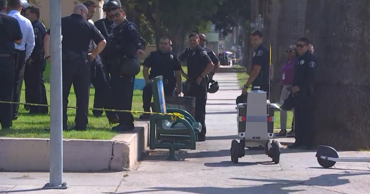 Food delivery robot drives through Los Angeles crime scene
