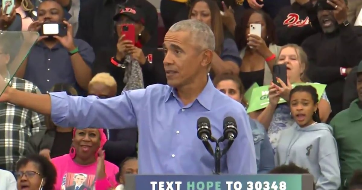 Obama interrupted by protester at Detroit rally