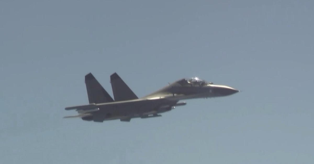 Watch As A Chinese Fighter Jet Intercepts Us Aircraft Over South China Sea