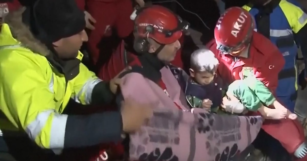 Video shows mom and young son saved from collapsed apartment