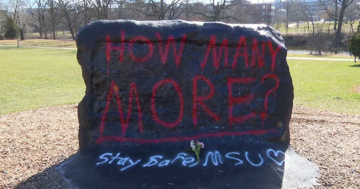 MSU students lay flowers at memorial for shooting victims