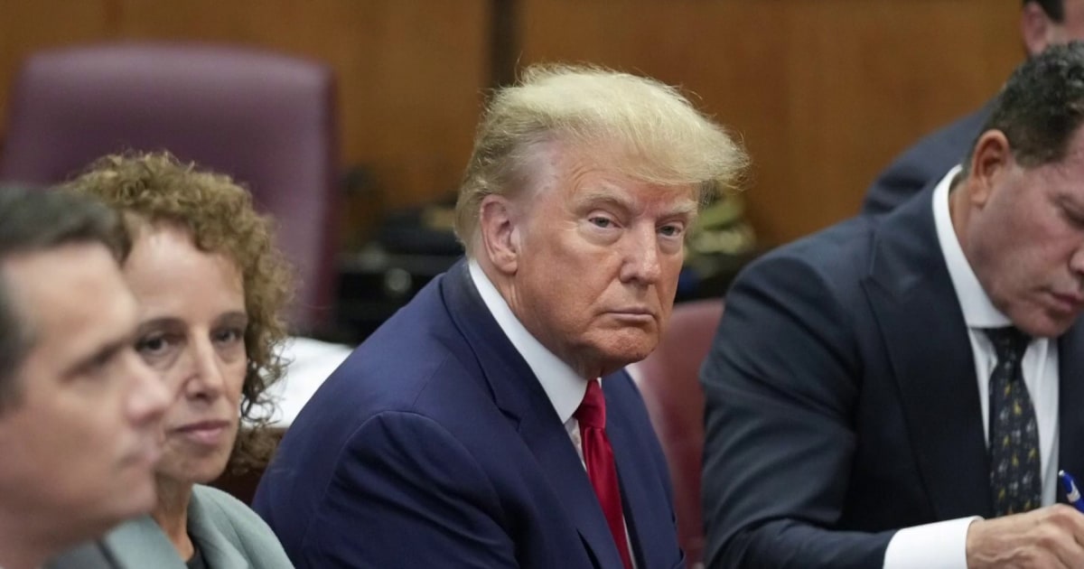 First photos released of Trump in courtroom for arraignment