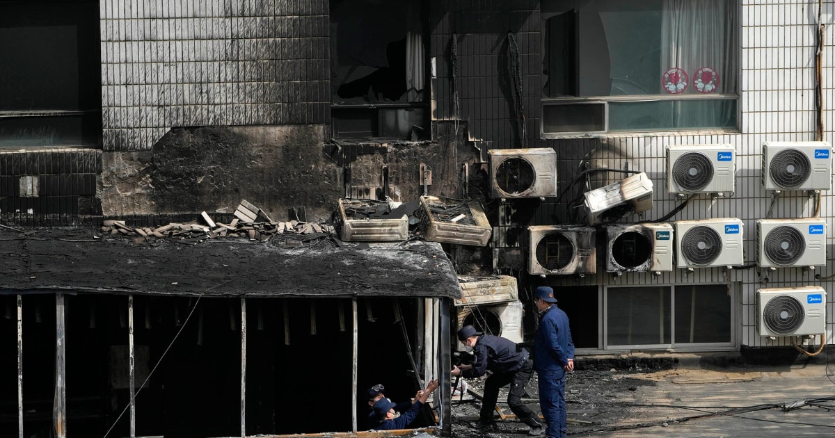 Video shows people using tied bedsheets to escape Beijing hospital fire