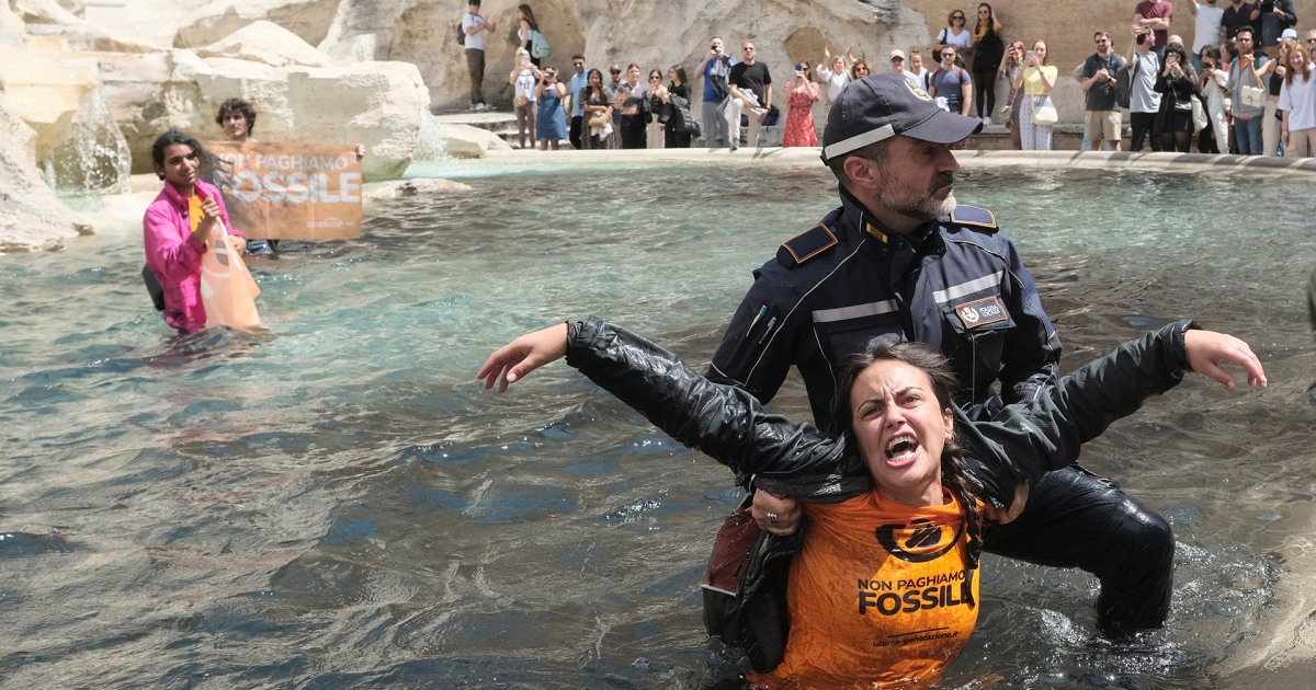Watch: Climate activists pour black liquid into Rome’s Trevi Fountain