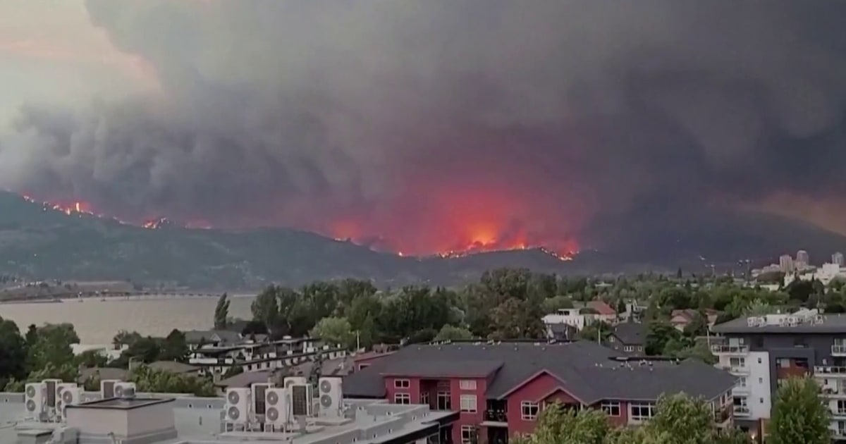 Thousands forced to evacuate as crews battle raging Canadian wildfires