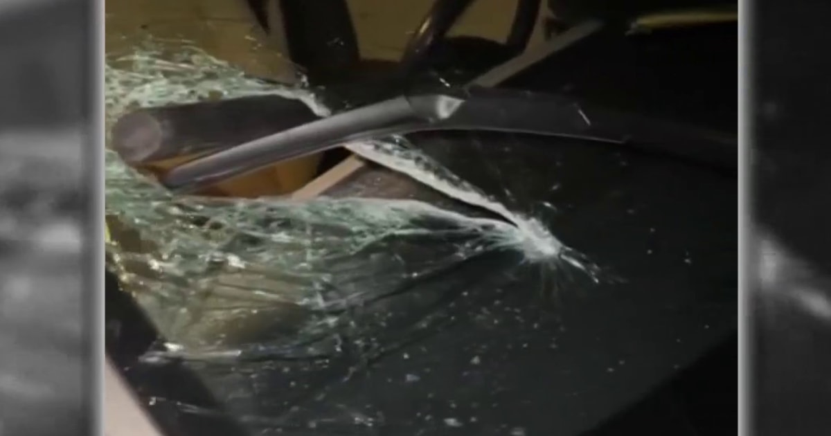 Spear thrown into windshield of moving car, police searching for suspect