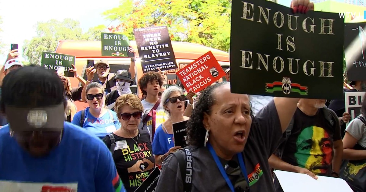 Protesters march in Miami in protest of new Black history standards