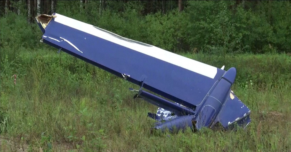 Body bags removed from crash site where Prigozhin is presumed to have died