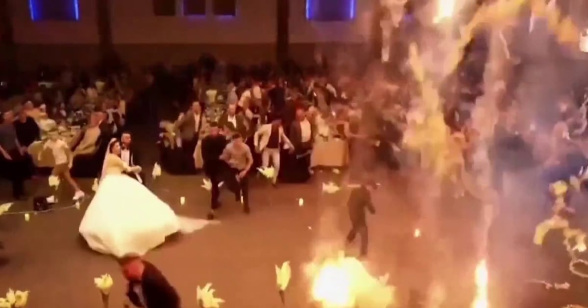 More than 90 people dead after Iraq wedding erupts in fire