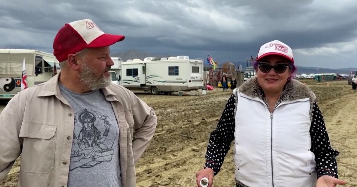 Burning Man attendees make the best of muddy Nevada festival