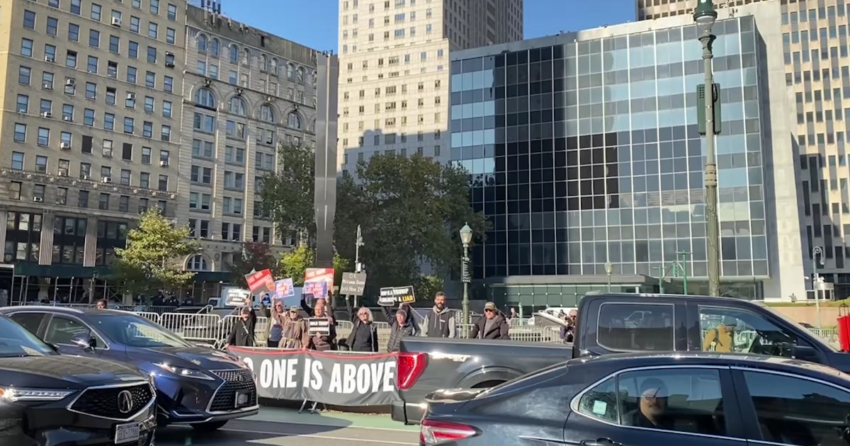 Protesters chant 'Trump lies all the time' outside court