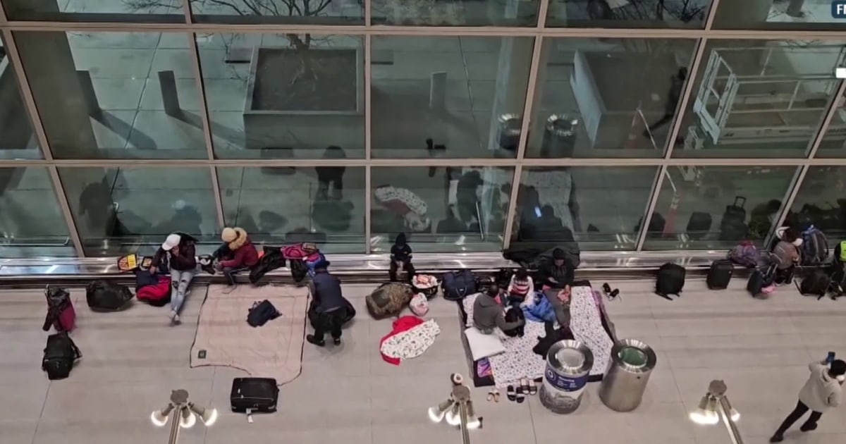 Migrants shelter inside Boston's Logan International Airport