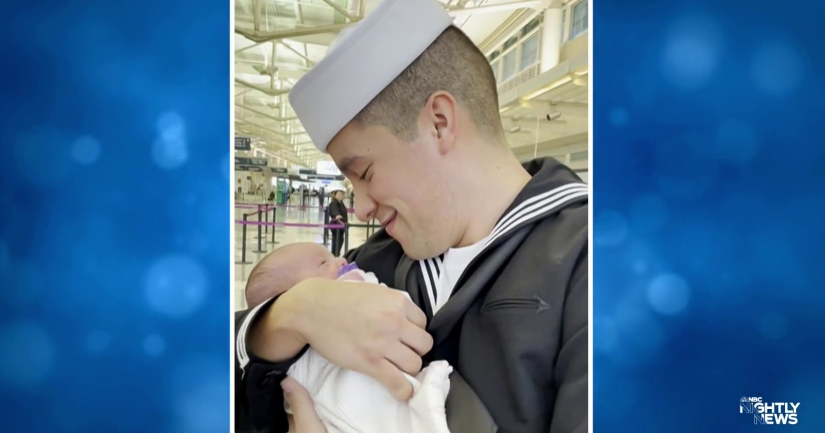 Navy sailor meets newborn daughter for first time in joyful moment