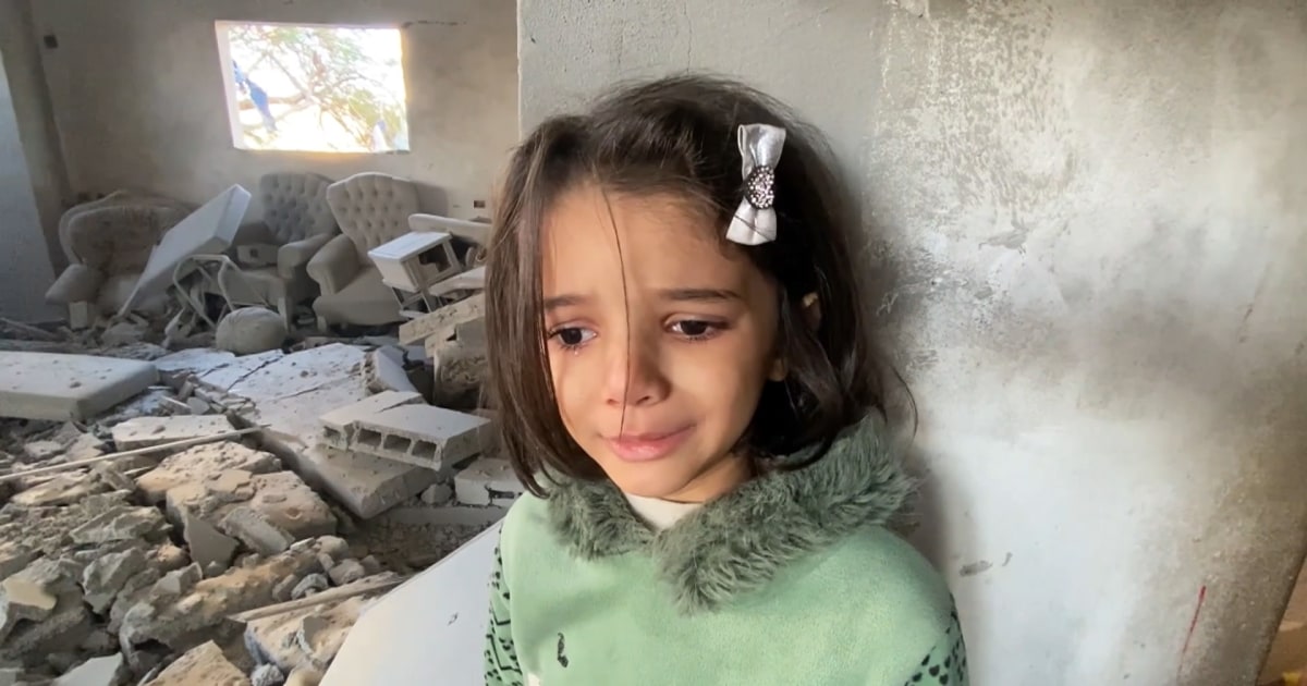 At least 13 killed in two families after airstrikes hit their Rafah homes
