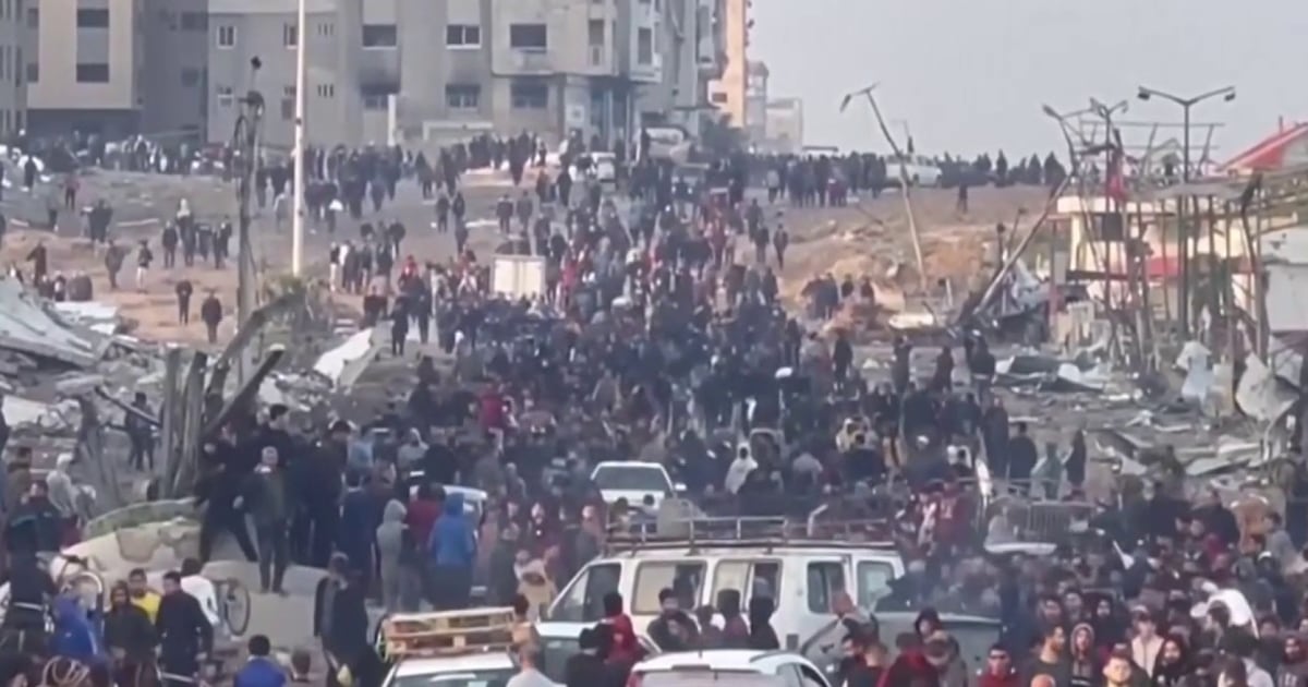 At least 100 killed in attack on crowd waiting for aid in Gaza City