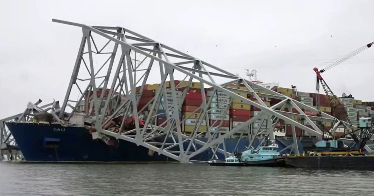 Workers create narrow channel through destroyed Baltimore bridge