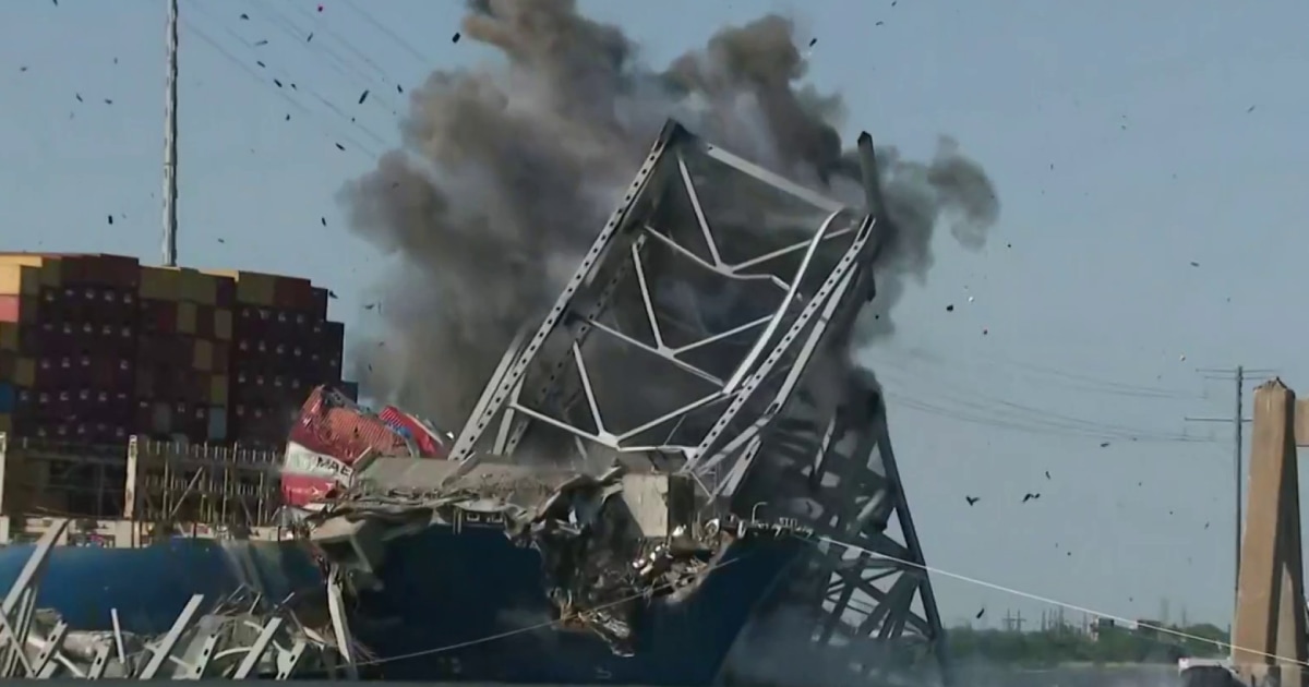 Section of Baltimore bridge brought down in controlled explosion