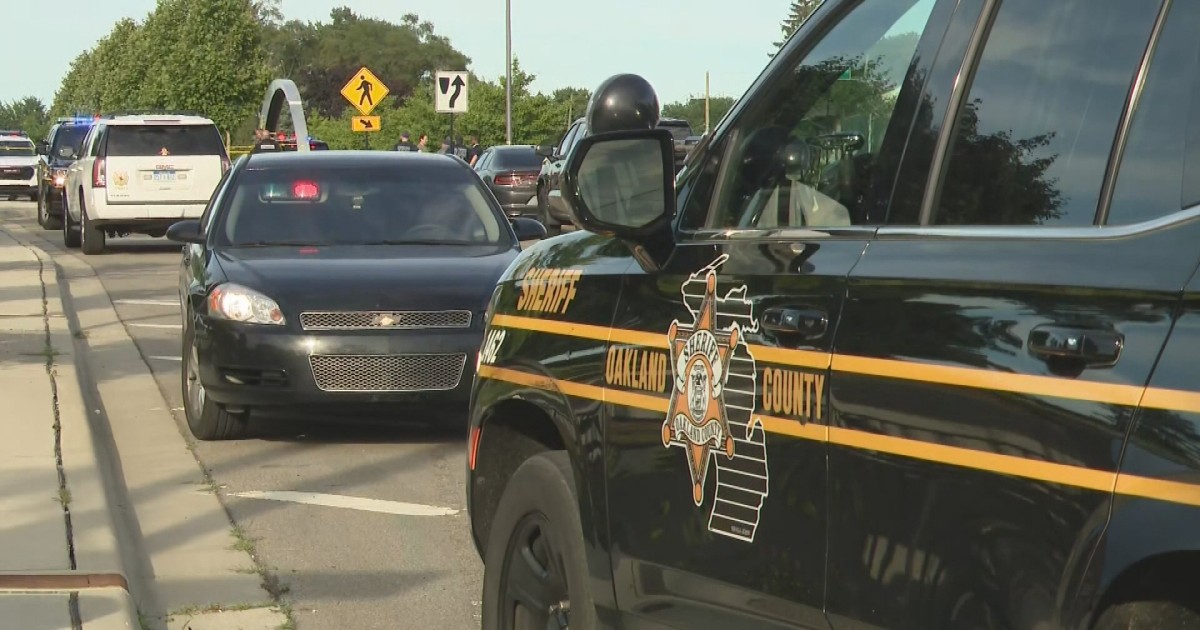 Neighbors look for answers after Michigan shooting
