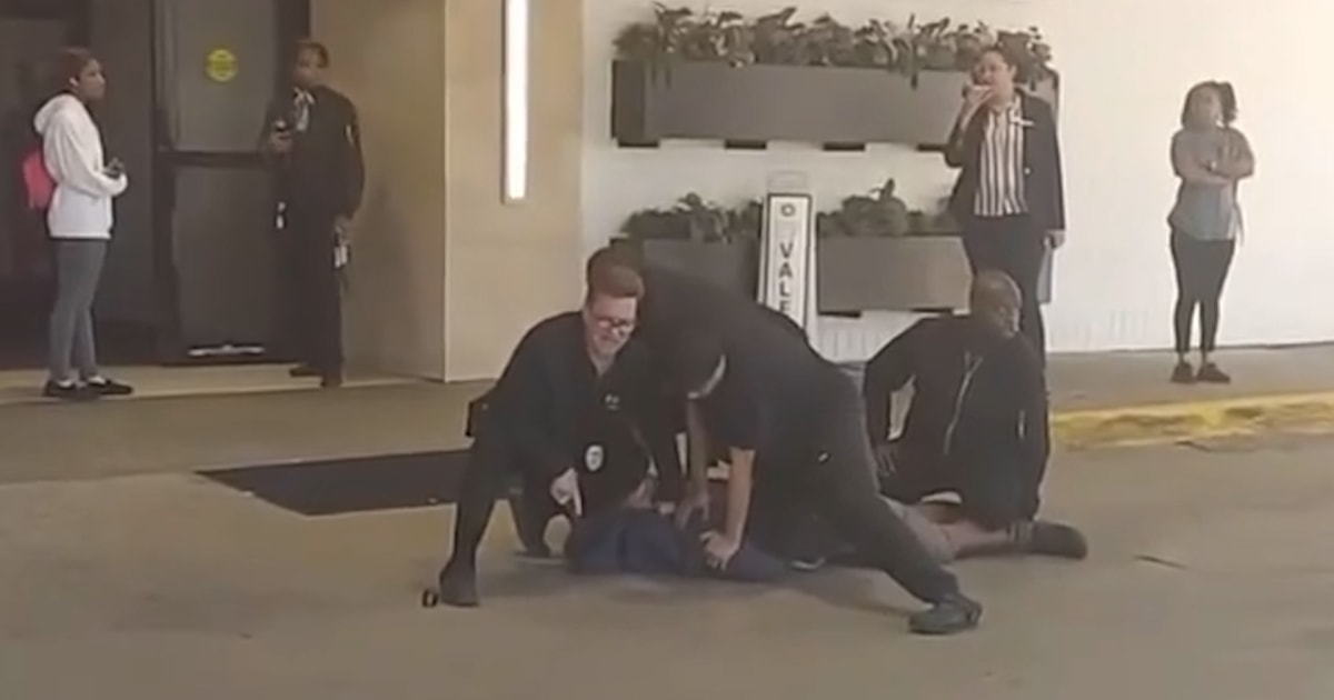 Video shows Black man being pinned down by Milwaukee hotel security ...