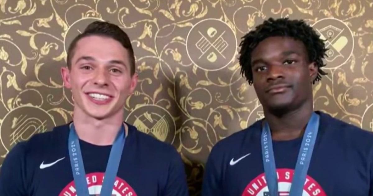 Team USA gymnasts Frederick Richard and Paul Juda celebrate bronze win