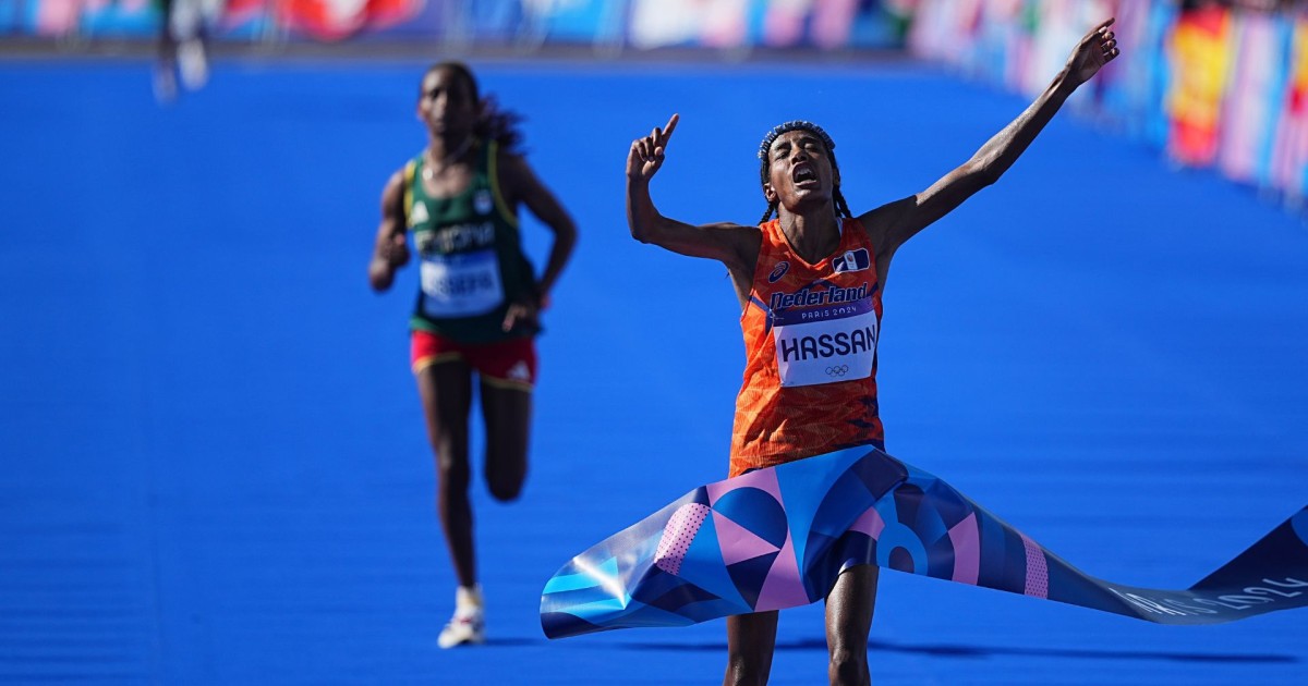 Sifan Hassan wins Olympic marathon in record time for third Paris medal
