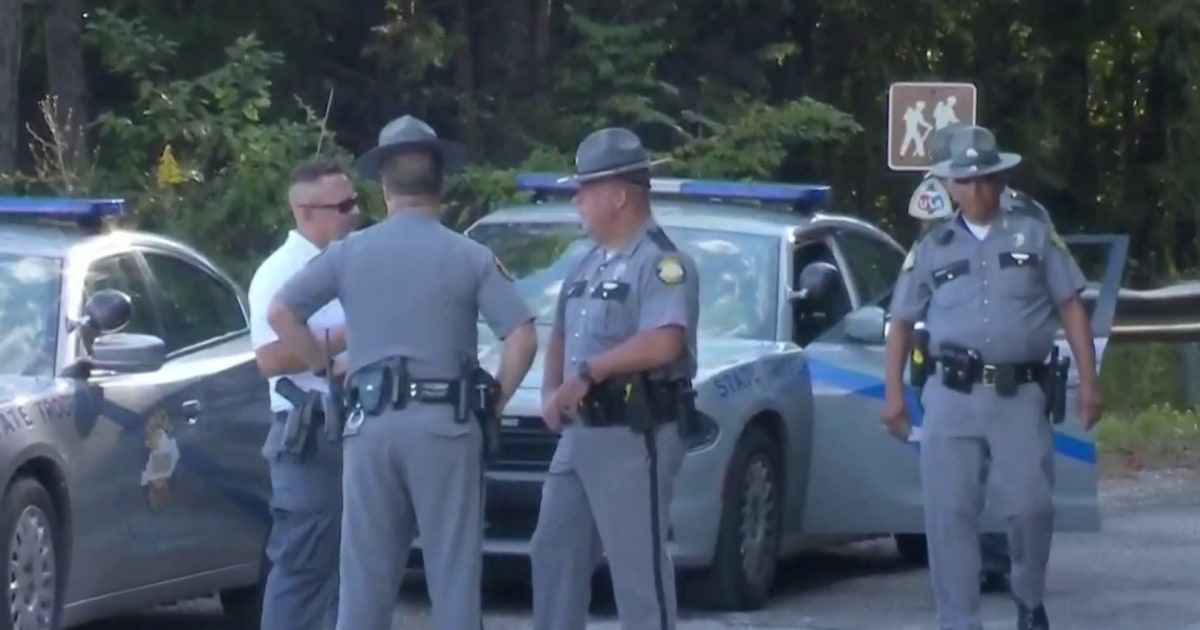 Kentucky police find body in search for highway shooting suspect