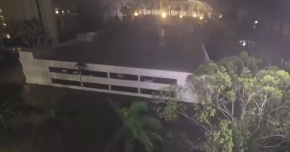 Debris swirls through air, storm surge rises in Sarasota