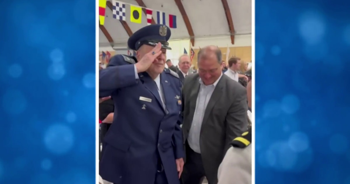 Hero grandfather salutes granddaughter at Navy officer graduation