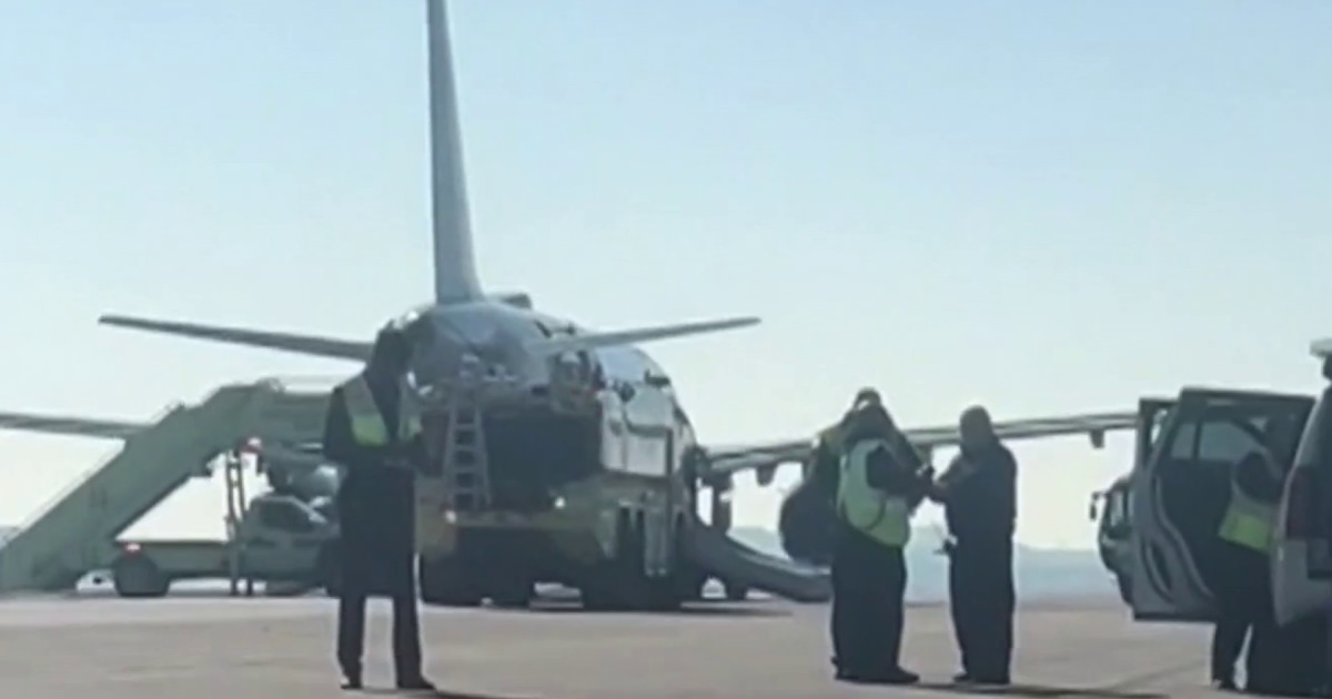 Flames erupt from wing of United Airlines flight before takeoff