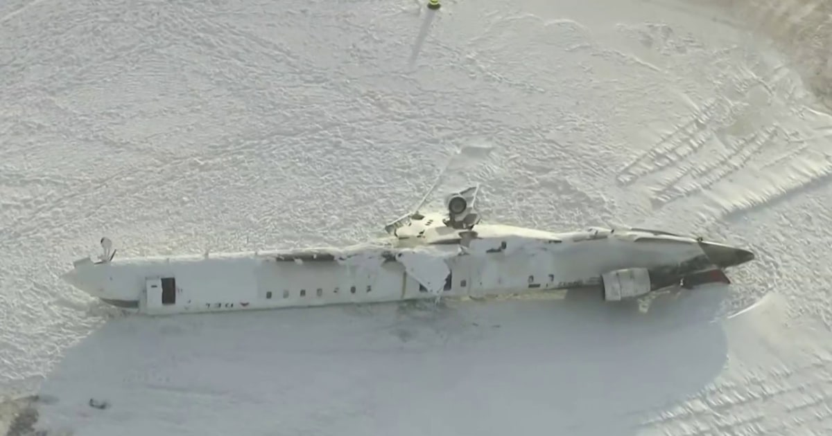 New images of crash landing in Toronto as investigators search for cause