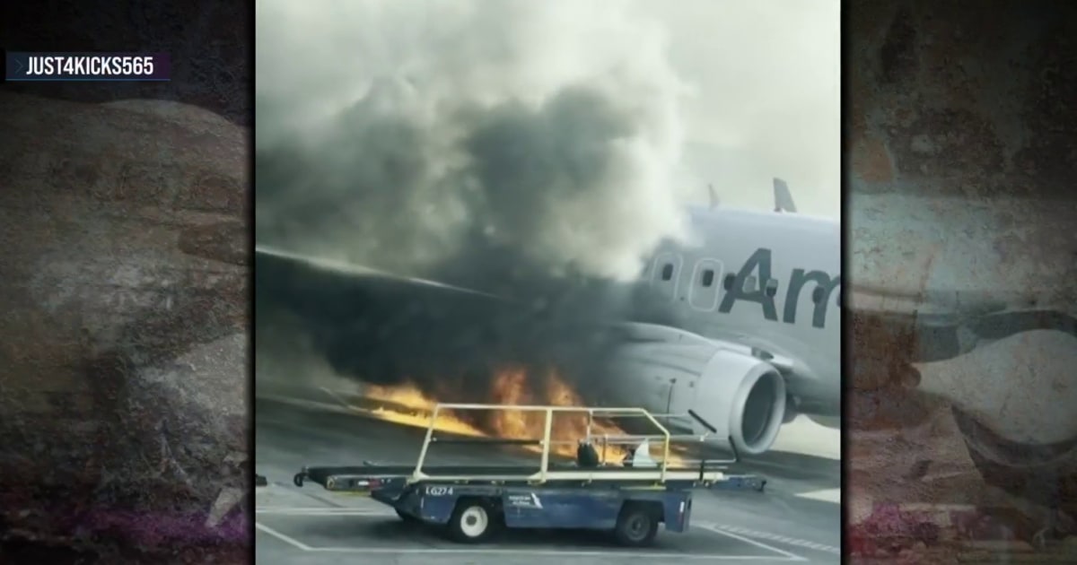 American Airlines plane catches fire in Denver