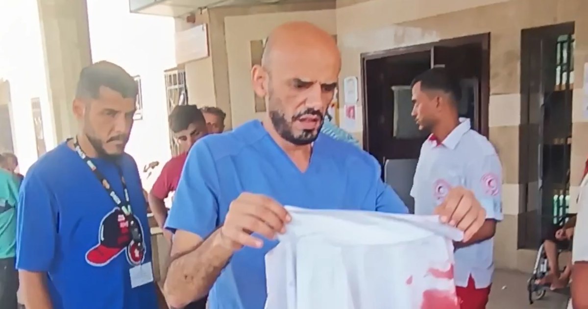 Gaza doctor holds injured nurse's blood-stained gown before second ...