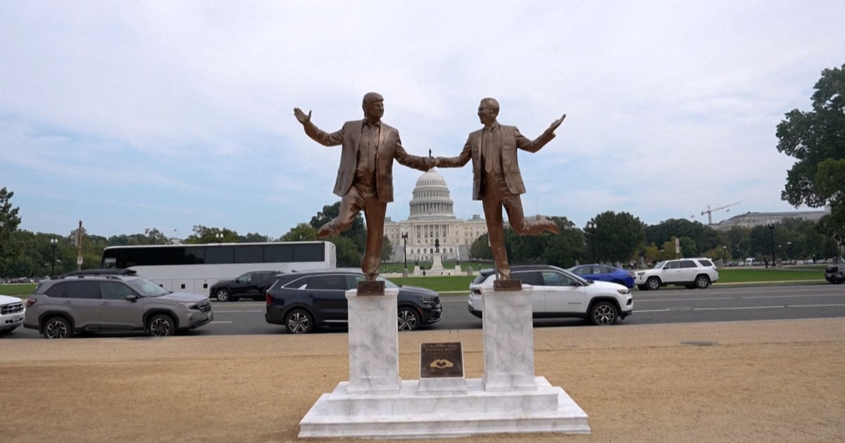 Statue of Trump and Epstein holding hands placed near U.S. Capitol
