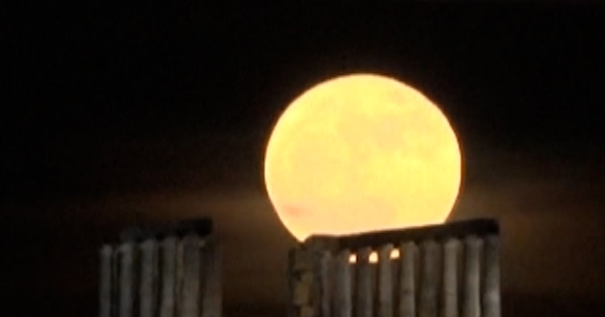 Rare ‘blue’ moon rises over the Poseidon temple in Greece