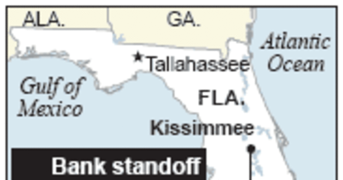 Hostages safe, robber dead in bank standoff