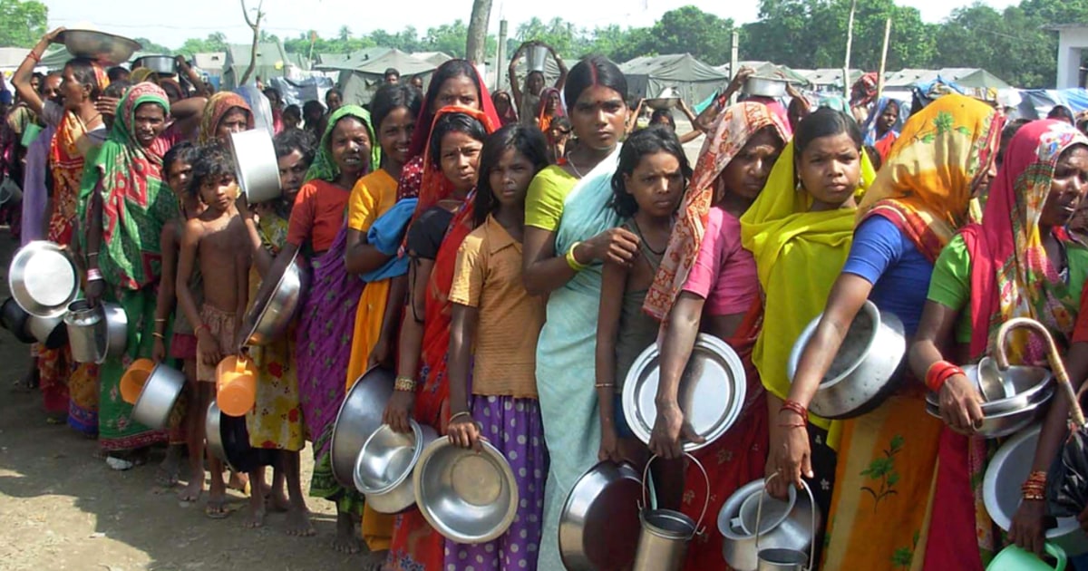 Floodwaters lap Taj Mahal, riots elsewhere