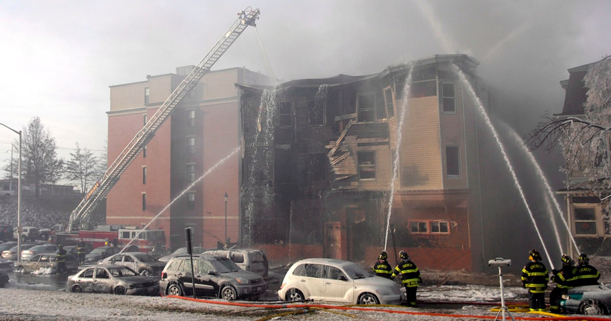 Tanker carrying gas overturns, destroys homes