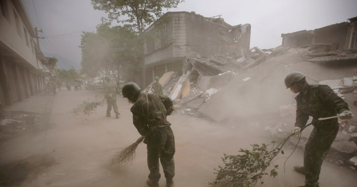 Woman freed after 9 days under quake rubble